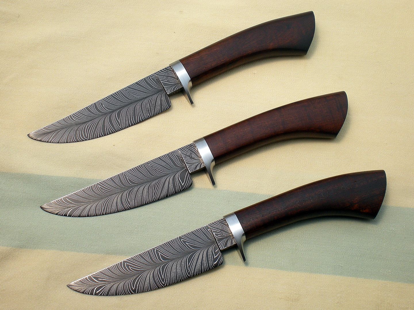 Three little feathers | BladeForums.com